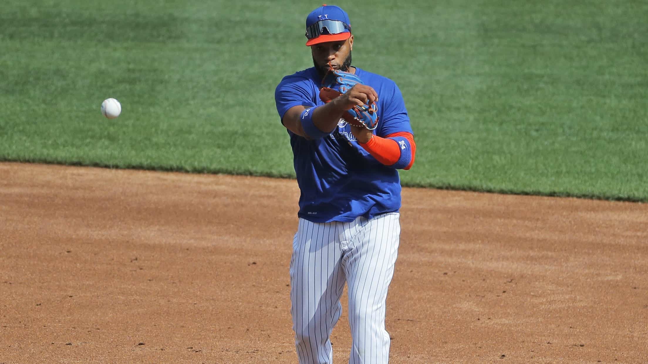 Robinson Cano returns to Mets camp, but won't enter games right away
