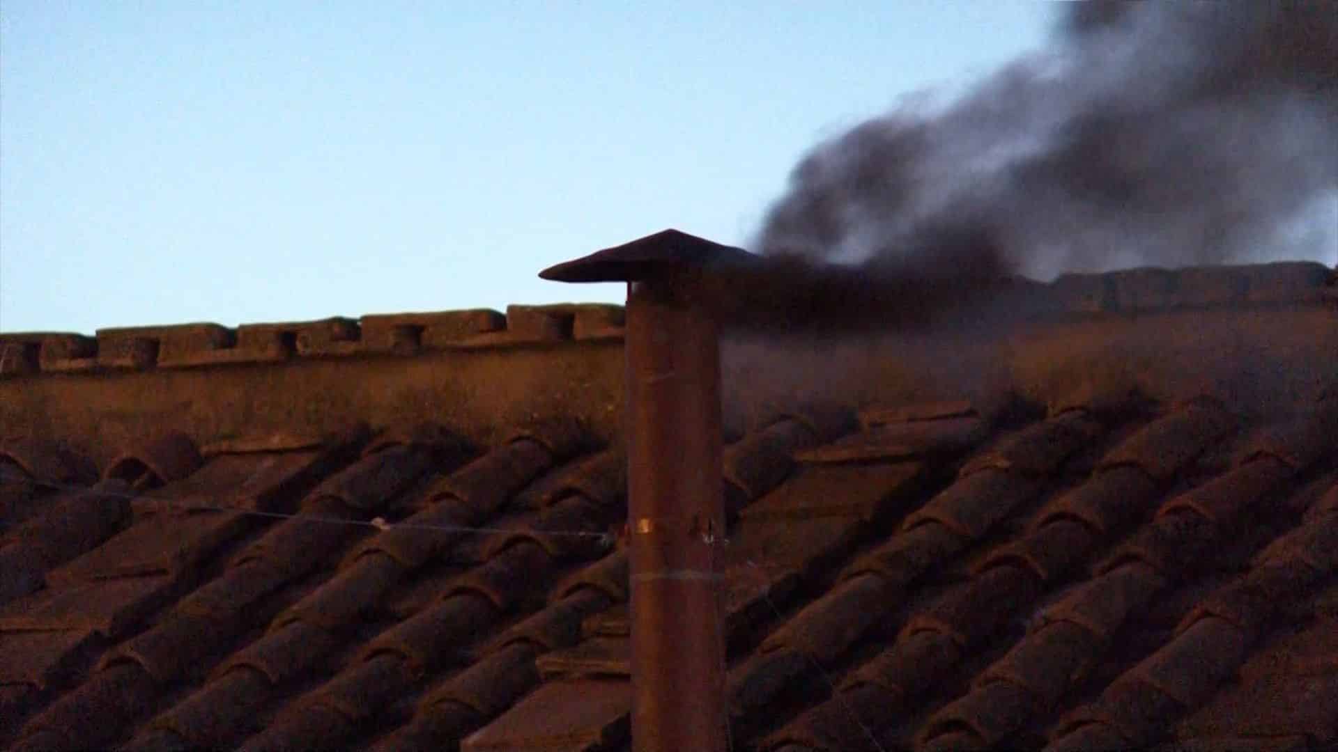 Black smoke signals no new pope yet at Vatican