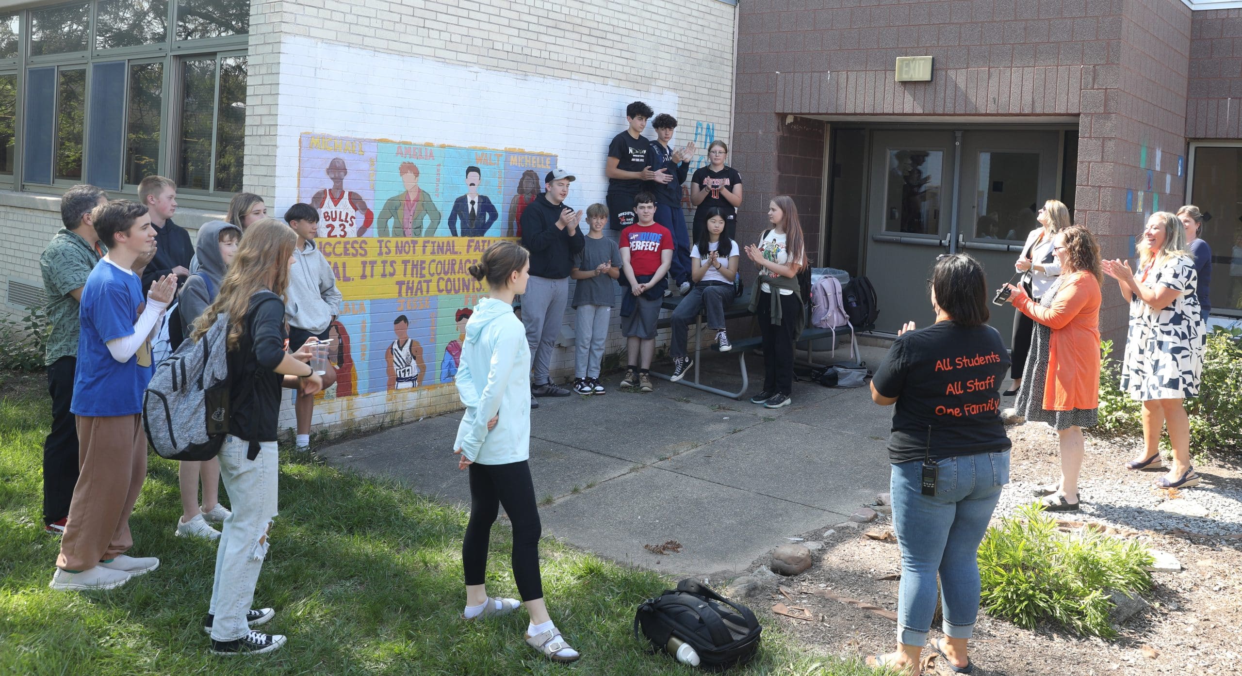 Students unveil hero-themed mural at Waterloo Middle School